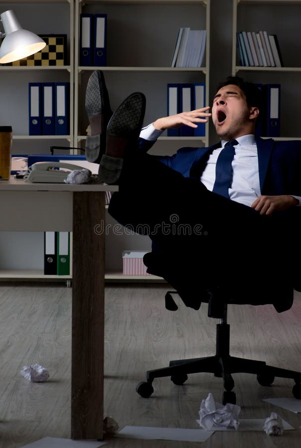 The Employee Working Late To Finish Important Deliverable Task Stock ...