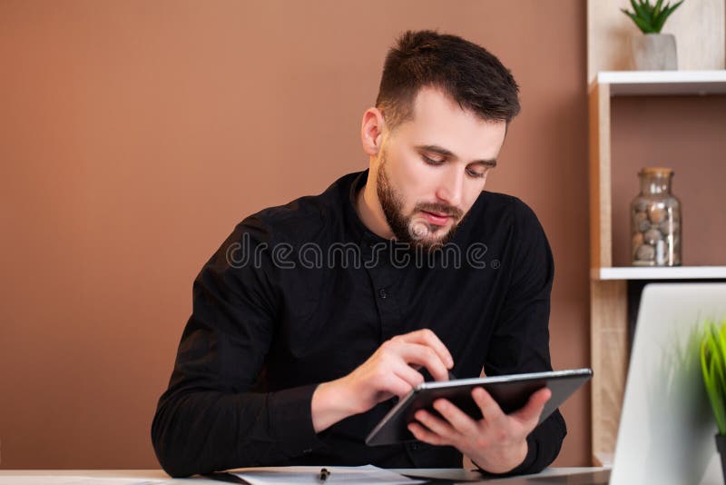 Employee Working on a Tablet in the Office Stock Image - Image of ...