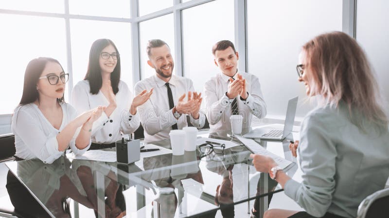 Employees Applauded at a Business Meeting in the Office. Stock Photo ...