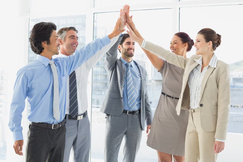 Employees Celebrating a Good Job Stock Photo - Image of front ...
