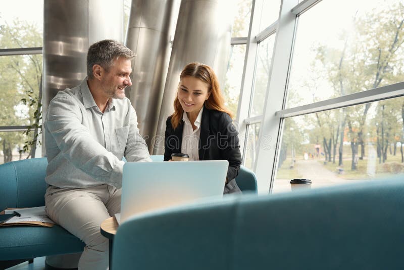 Employees Communicate in the Office Recreation Area on Blue Sofa Stock ...