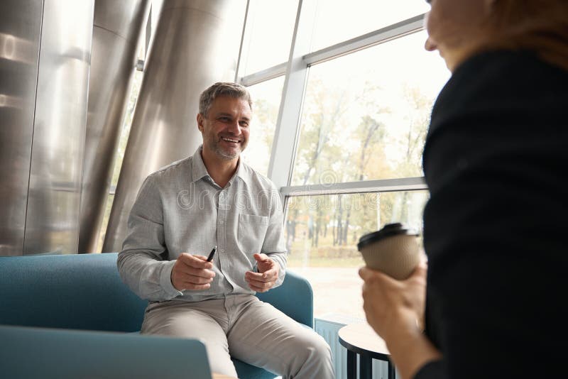 Employees of the Company Communicate Friendly in the Recreation Area ...