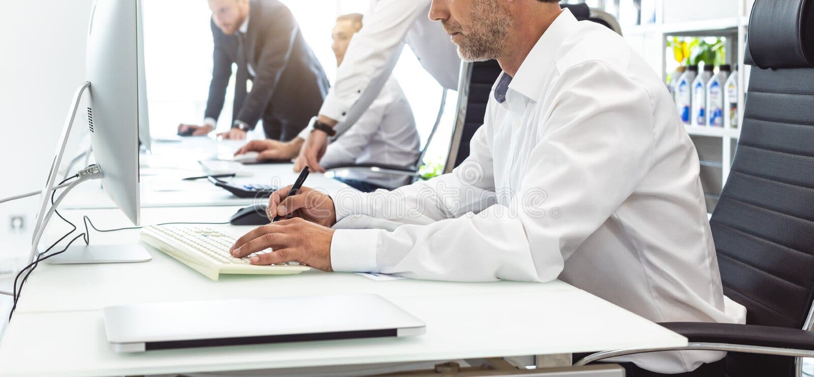 Employees of the Company Work at Computers in the Office. Interaction ...