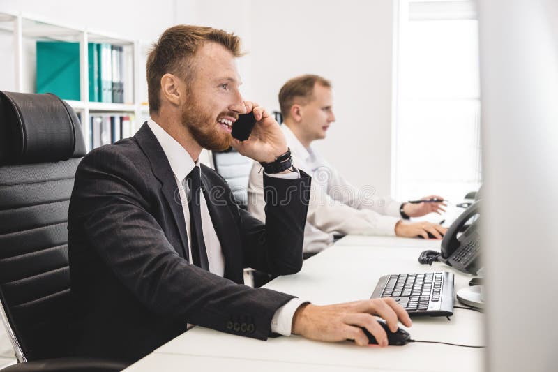 Employees of the Company Work at Computers in the Office. Interaction ...