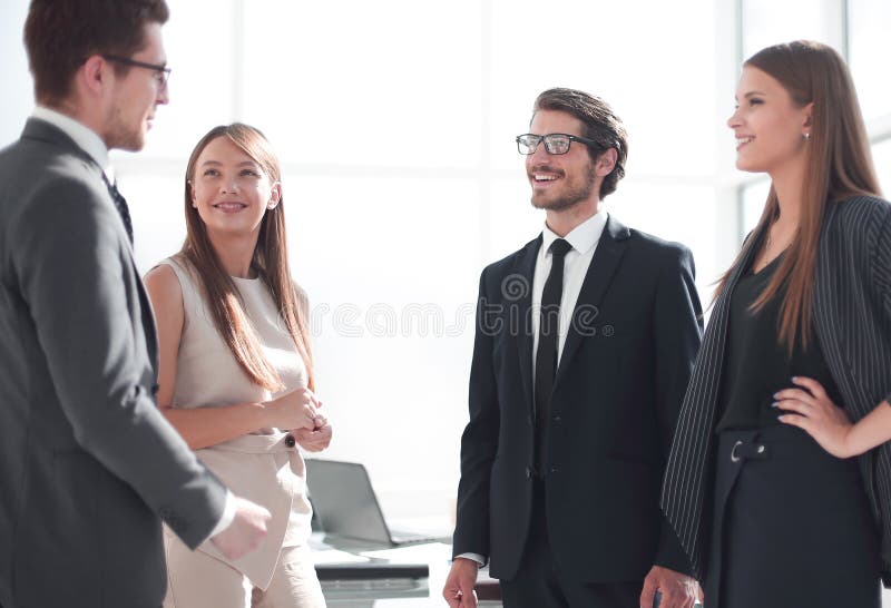 Employees Discuss Something Standing in the Office Stock Photo - Image ...