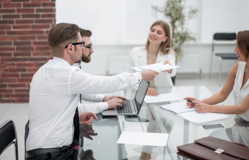 Employees Discussing Business Documents. Stock Image - Image of ...