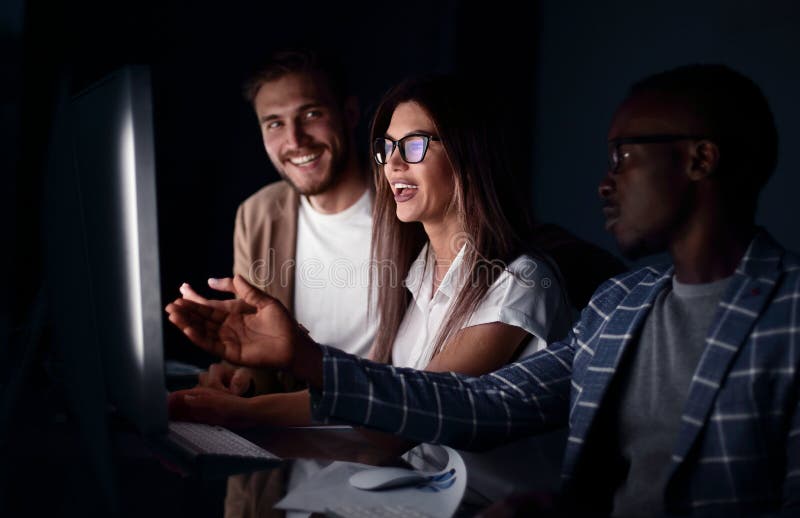 Employees Discussing Something Sitting at the Desk Stock Photo - Image ...