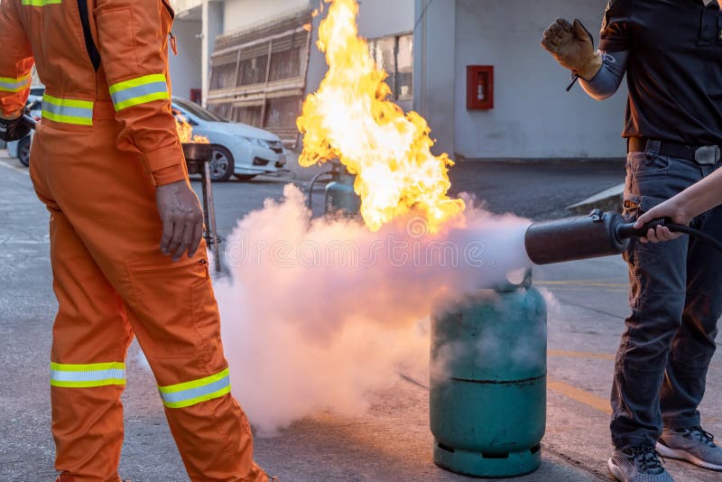 Employees Firefighting Training,Extinguish a Fire Stock Image - Image ...