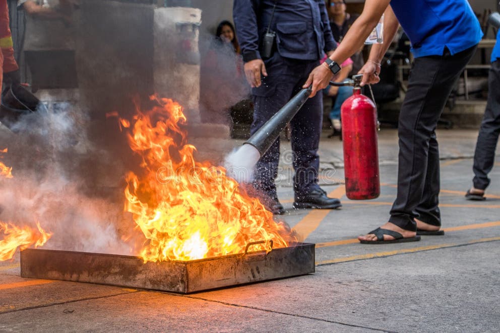 Employees Firefighting Training,Extinguish a Fire Stock Image - Image ...