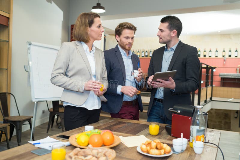 Employees Having Breakfast Meeting Stock Photo - Image of breakfast ...