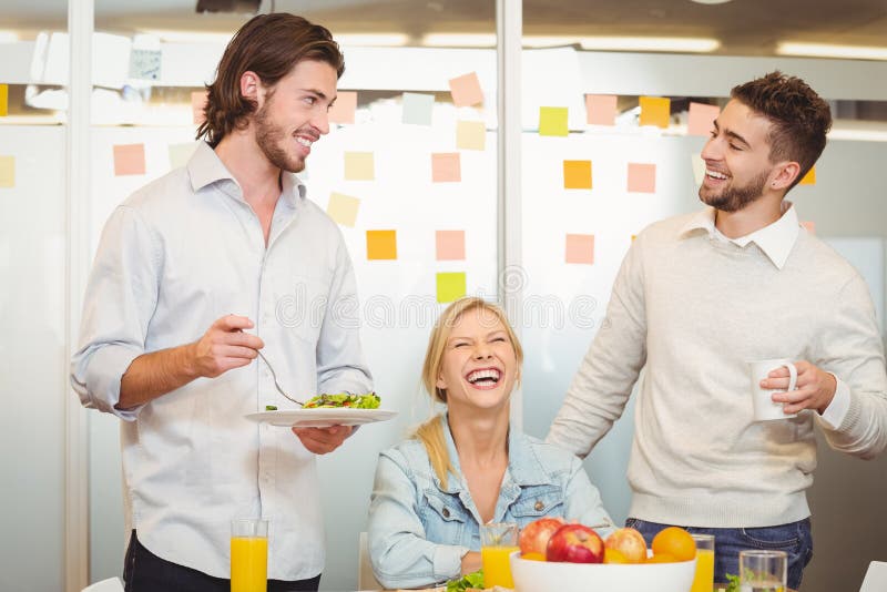 Employees Having Fun during Breakfast Stock Image - Image of casual ...