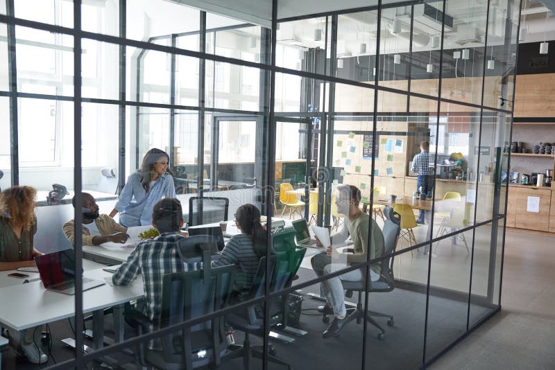 Staff Discussing Plans and Bargains for Future Stock Photo - Image of ...