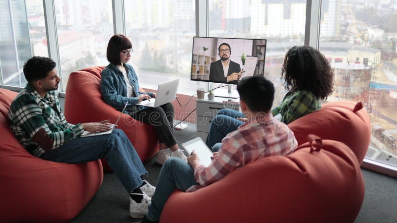 Employees Making Video Call on Display in Office Interior Stock Video ...
