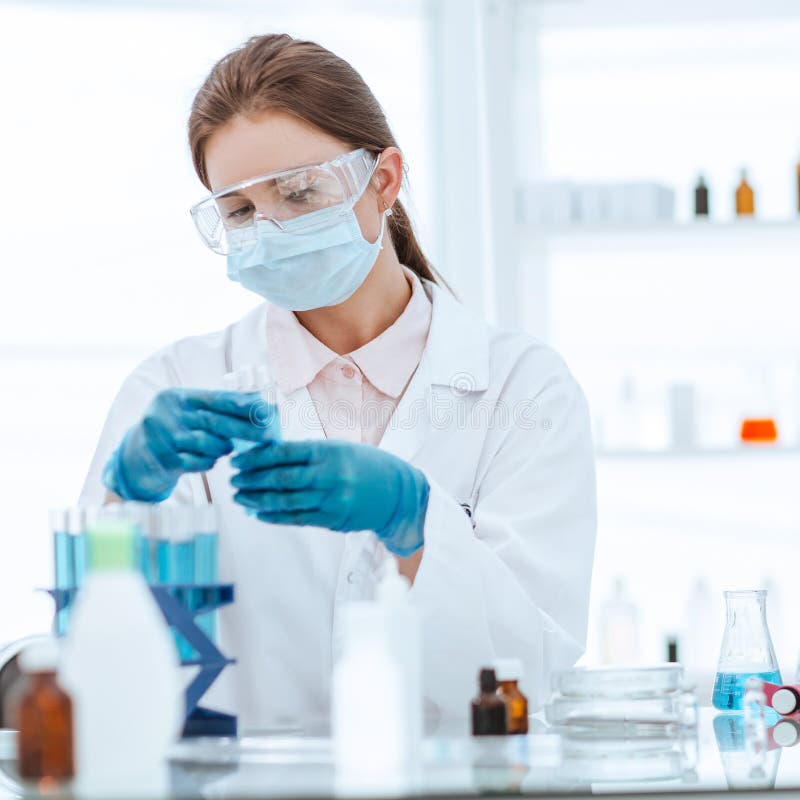 Blood Testing Laboratory. Samples Viewing Under Microscope Near Tubes ...