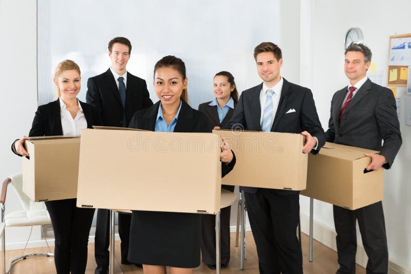 Employees in Office Holding Cardboard Boxes Stock Image - Image of ...