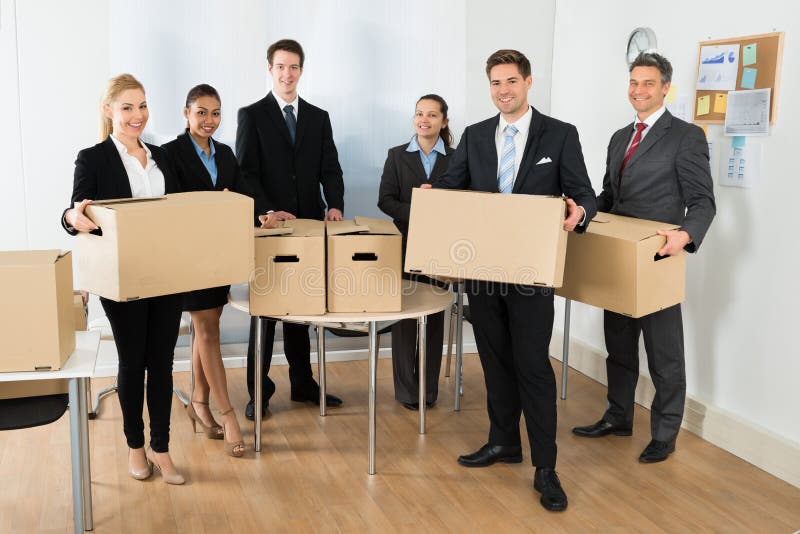Employees in Office Holding Cardboard Boxes Stock Image - Image of ...
