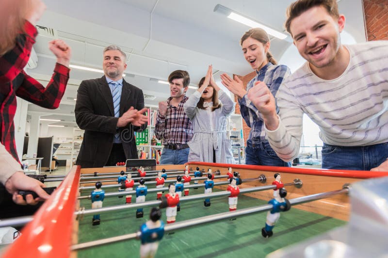 Employees Playing Table Soccer Stock Image - Image of skills, playing ...