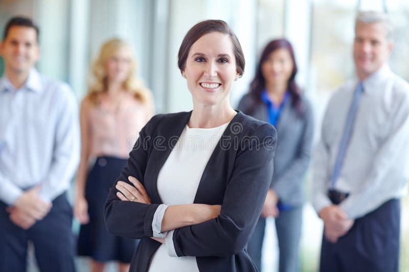 Employees Prosper Under Her Management. a Group of Executives Standing ...