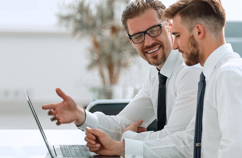 Employees Sitting at a Desk in a Modern Office Stock Photo - Image of ...