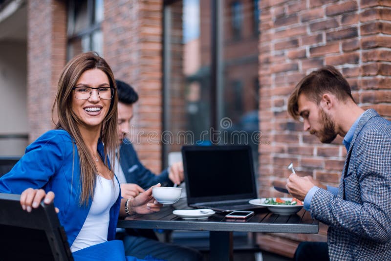 Employees Sitting at a Table in a Cafe Stock Photo - Image of adult ...