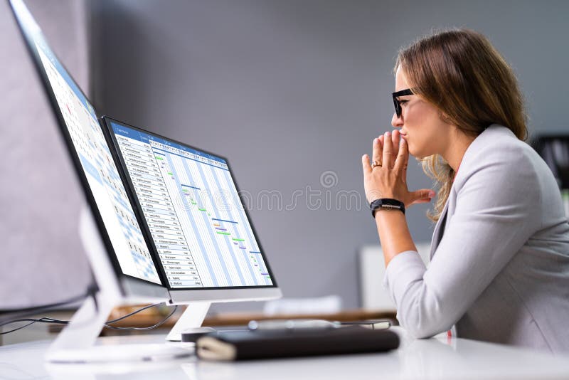 Employees Staff Schedule and Time Reports on Computer Stock Photo ...