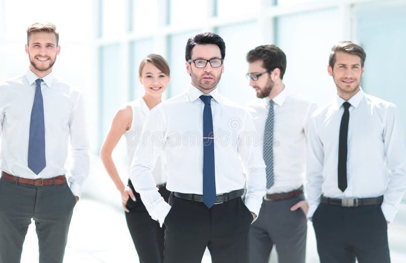 Employees Standing in a Bright Office. Stock Photo - Image of leader ...