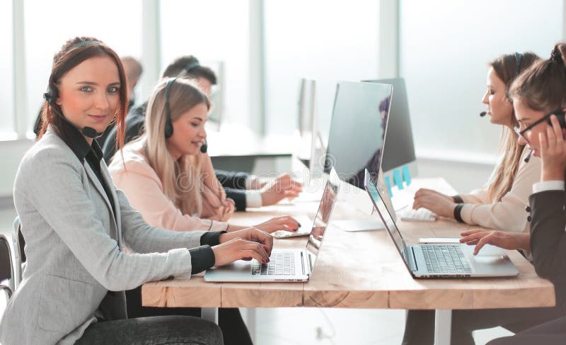 Employees of the Support Center at the Workplace in the Office Stock ...