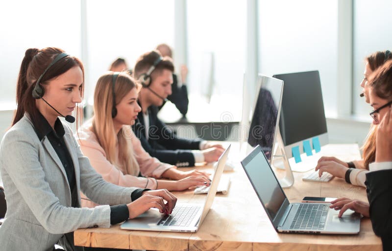 Employees of the Support Center at the Workplace in the Office Stock ...