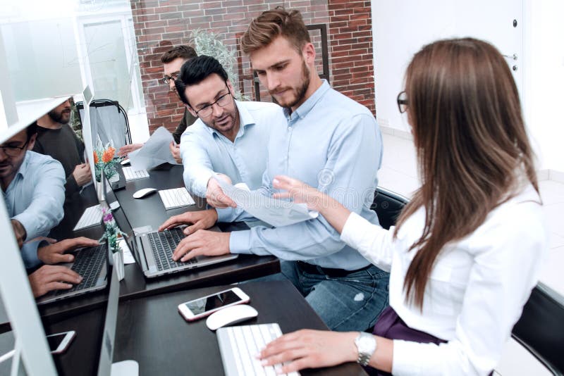 Employees Use Computers To Work with Business Documents Stock Image ...