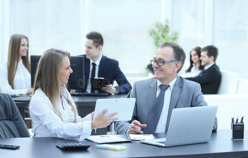 Employees Using Digital Tablet To Work with Financial Data Stock Image ...