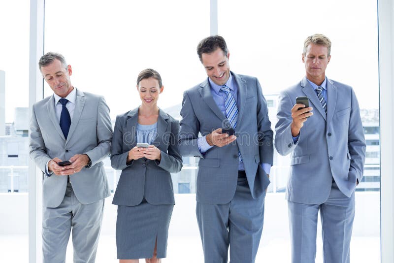 Employees Using Their Mobile Phone Stock Image - Image of dressed, male ...