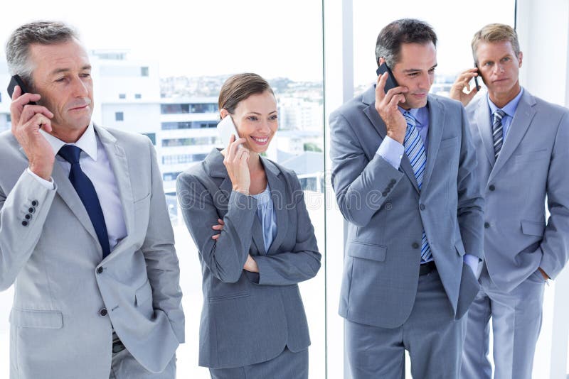 Employees Using Their Mobile Phone Stock Image - Image of dialing ...