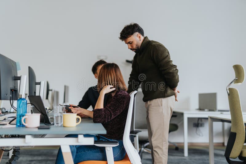 Employees Work Together on Project Development, Sharing Knowledge and ...