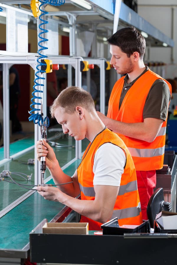 Employees at Production Area Stock Photo - Image of area, industrial ...