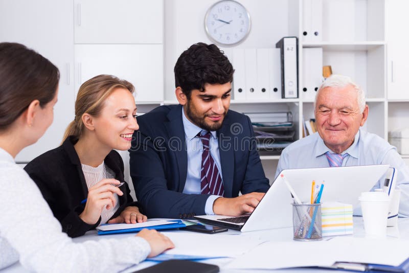 Employees are Working Together at Computer Stock Image - Image of ...