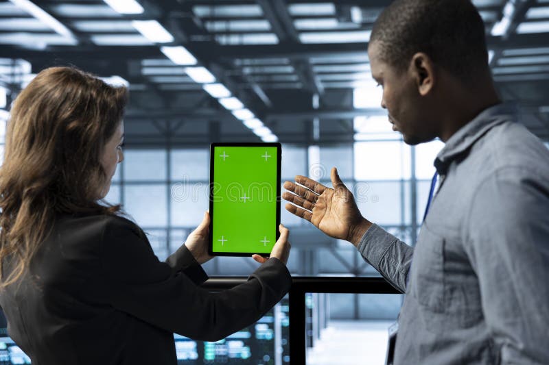 Employees Working Together in Data Center Using Isolated Screen Tablet ...