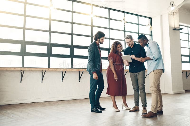 Empowering Productivity with Teamwork and Technology. a Group of ...