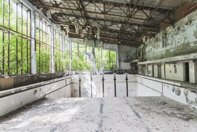 The Abandoned Pool is Empty, Old and Rotten, with Lots of Leaves and ...