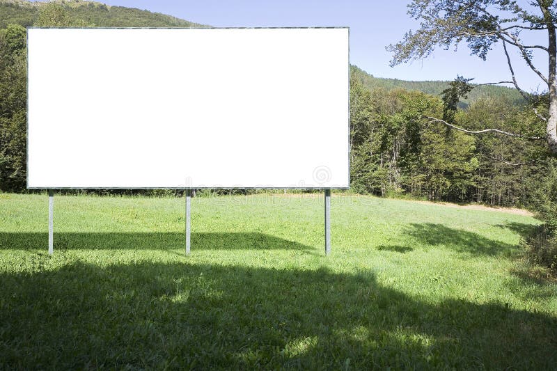 EMPTY ADVERTISING BILLBOARD in a RURAL LANDSCAPE SURROUNDED by TREES ...