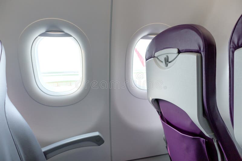 Empty Air Plane Seats and Window Providing Space for Place Text. Modern ...