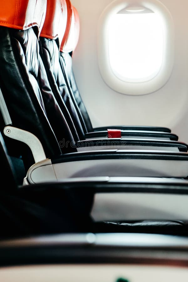 Empty Airplane Seats and Window Stock Photo - Image of boarding, seat ...