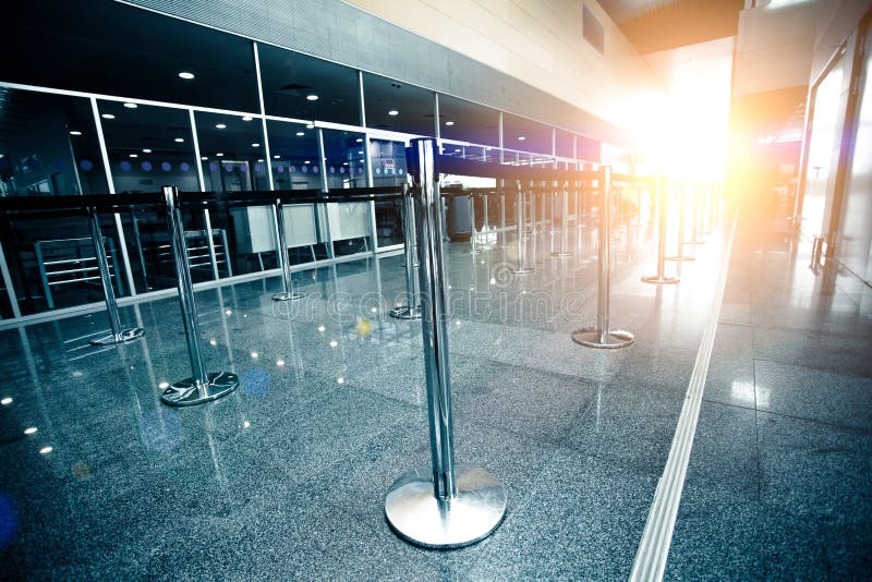 Empty Airport Check-in Line Lit by Sun Beam Stock Photo - Image of ...
