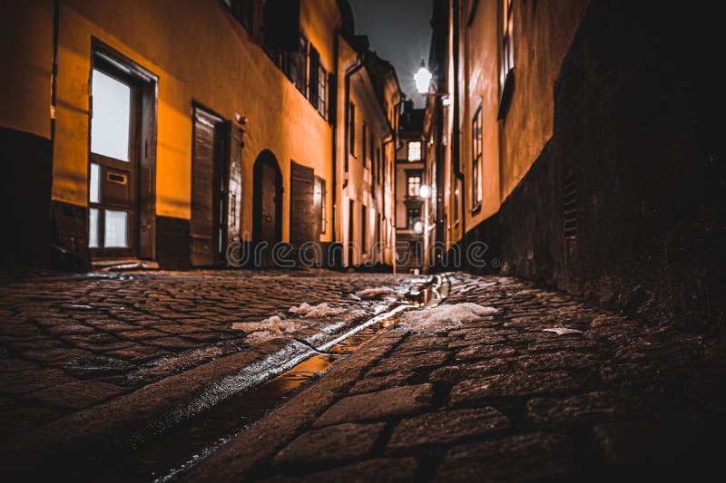 Empty Alley Amidst Buildings in City at Night Stock Image - Image of ...