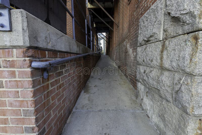 Empty alley way is clean stock photo. Image of dark - 162543218