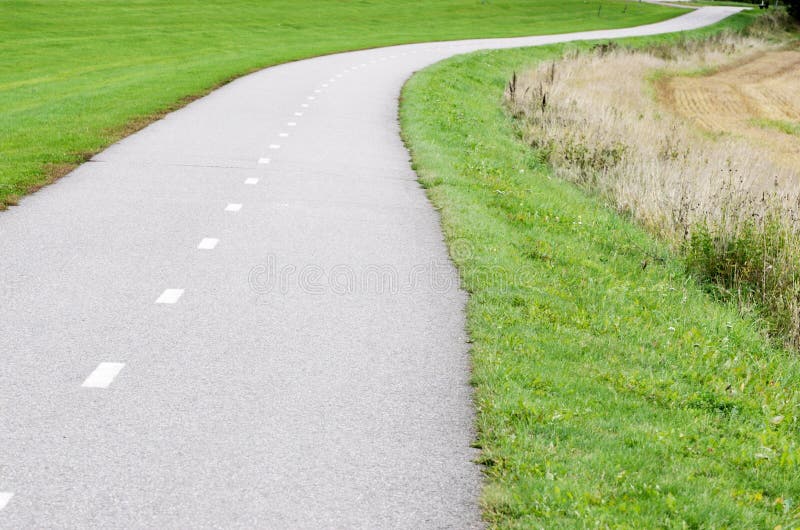 Empty asphalt bike path stock photo. Image of driveway - 33952060