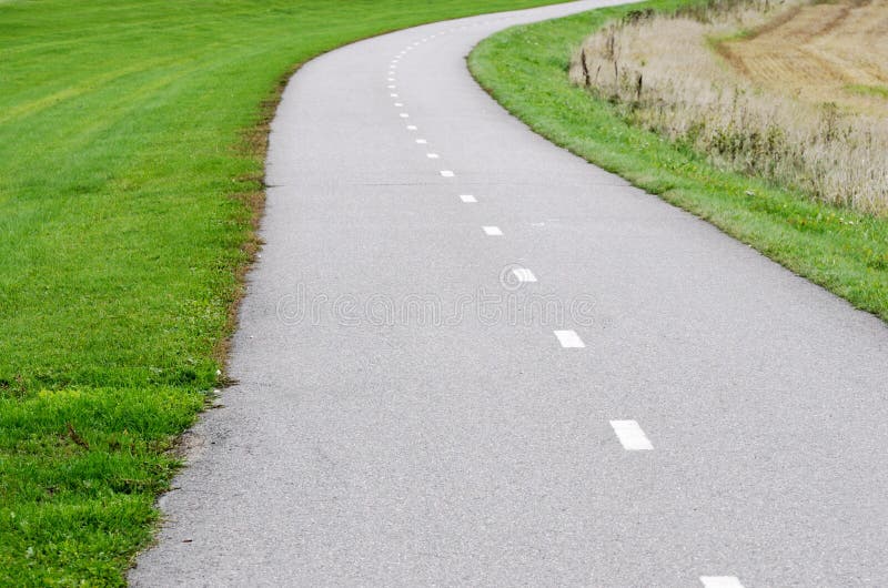 Empty asphalt bike path stock photo. Image of jogging - 33952078