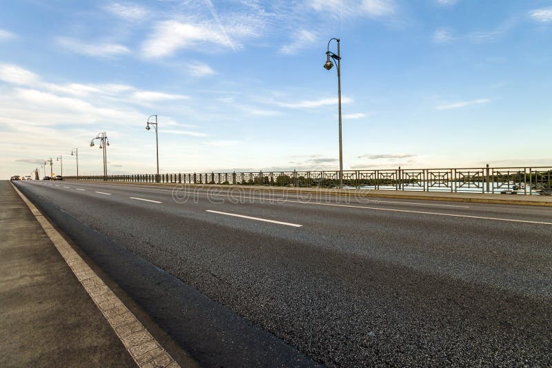 Empty Asphalt Road on a Bridge Over River Stock Photo - Image of road ...