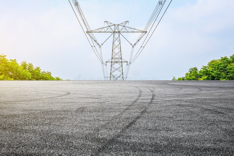 Asphalt Road and High-voltage Electrical Tower Stock Image - Image of ...