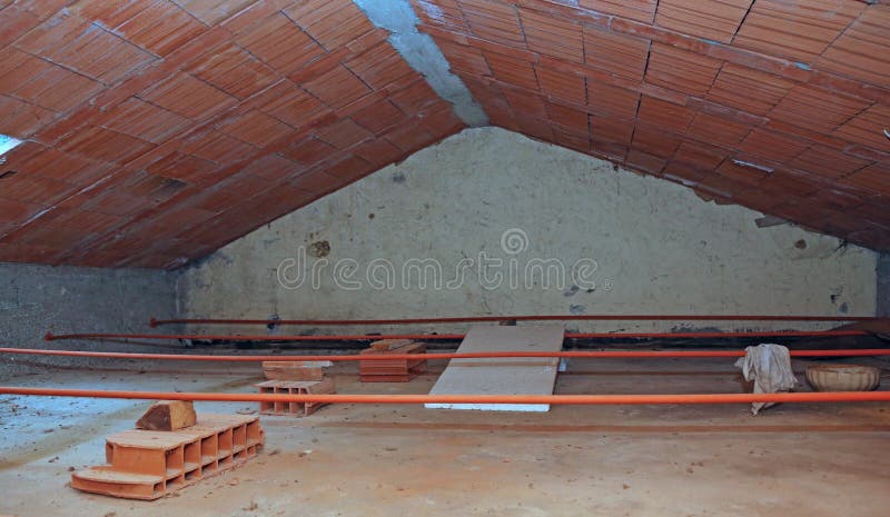 Attic of the House with Sloping Roof and Rough Bricks Stock Image ...