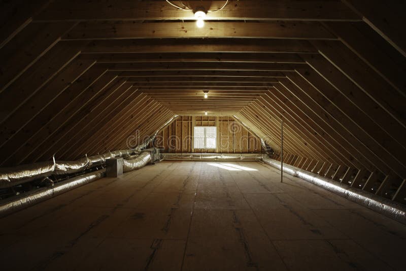Empty Attic Space with Exposed Wooden Beams and Light Stock Photo ...